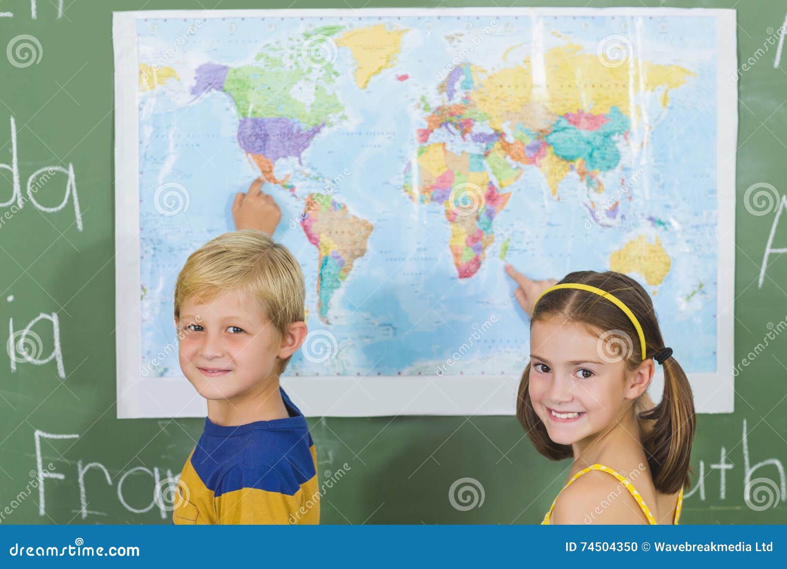 School Kids Pointing At Map In Classroom Royalty-Free Stock Image ...