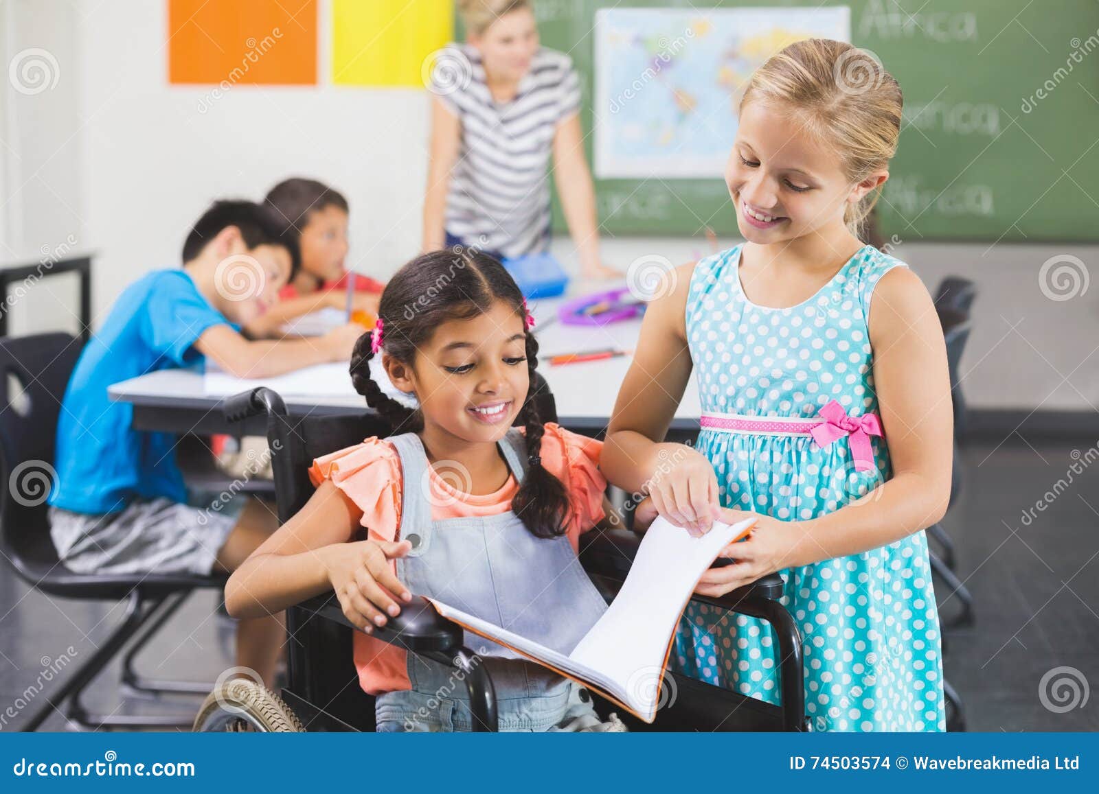 School Kids Reading Book in Classroom Stock Photo - Image of chair ...