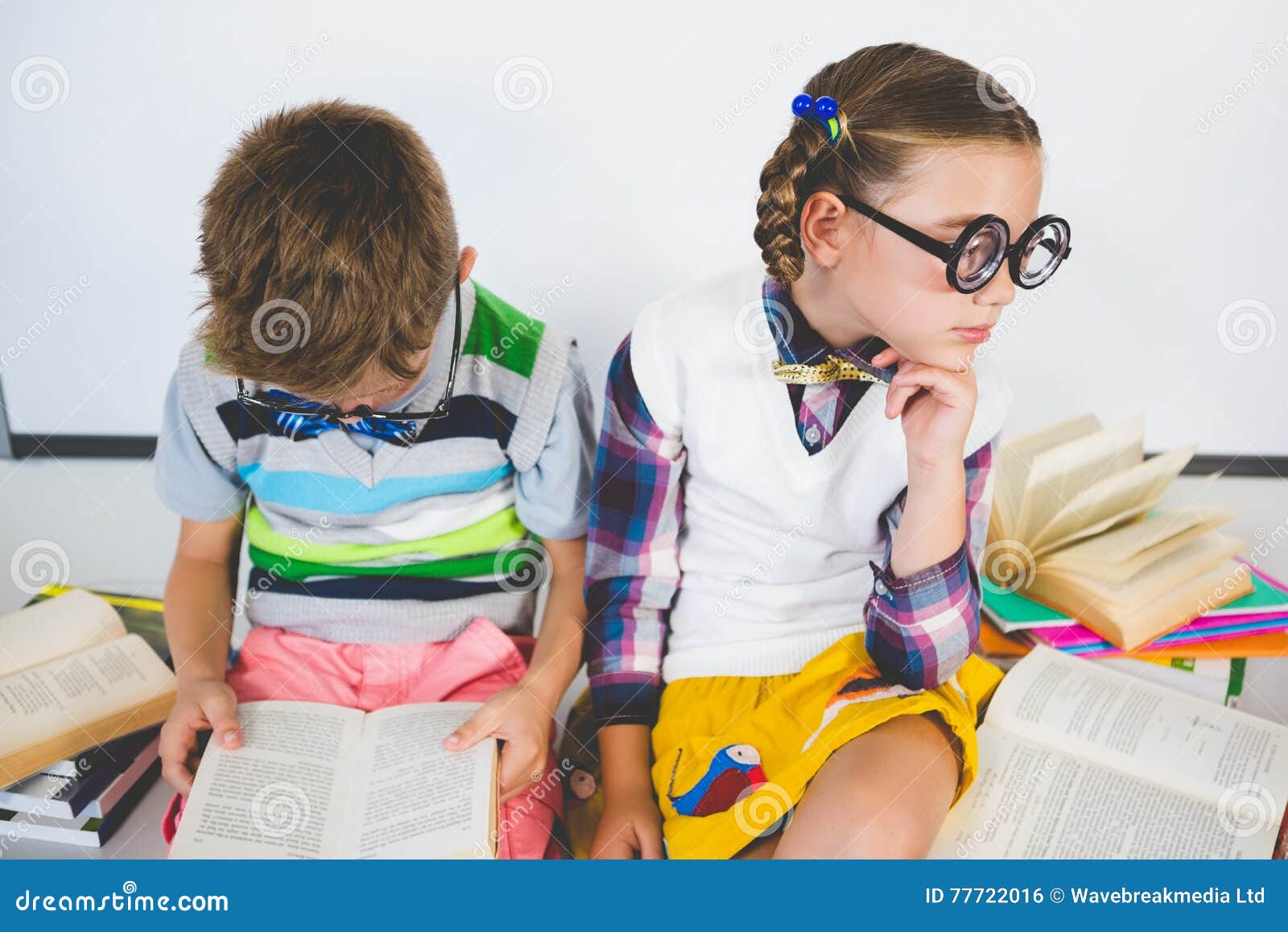 School Kids Reading Book in Classroom Stock Photo - Image of ...