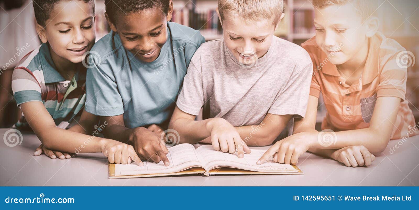 School Kids Reading Book Together in Library Stock Image - Image of ...