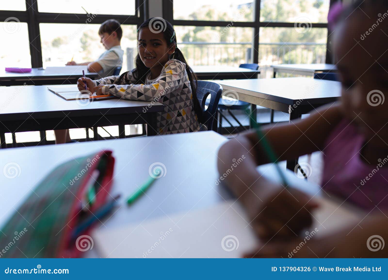 School Kids Sitting and Working in Classroom Stock Photo - Image of ...