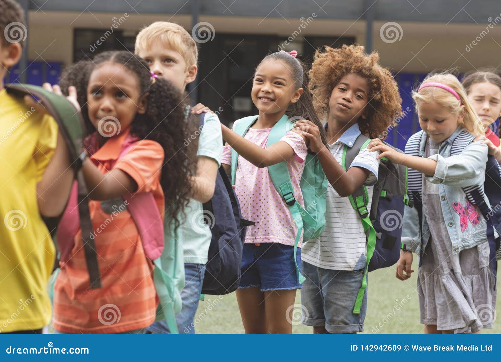 School Kids Standind in a Queue at Schoolyard Stock Image - Image of ...