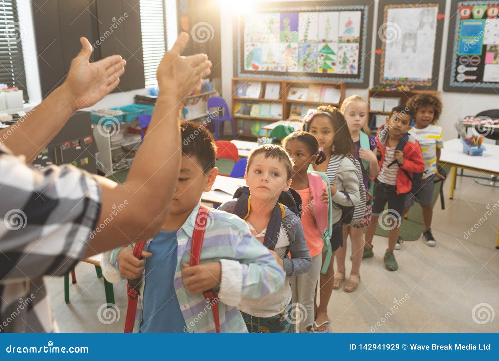School Kids Standing and Forming a Queue in Classroom at School Stock ...