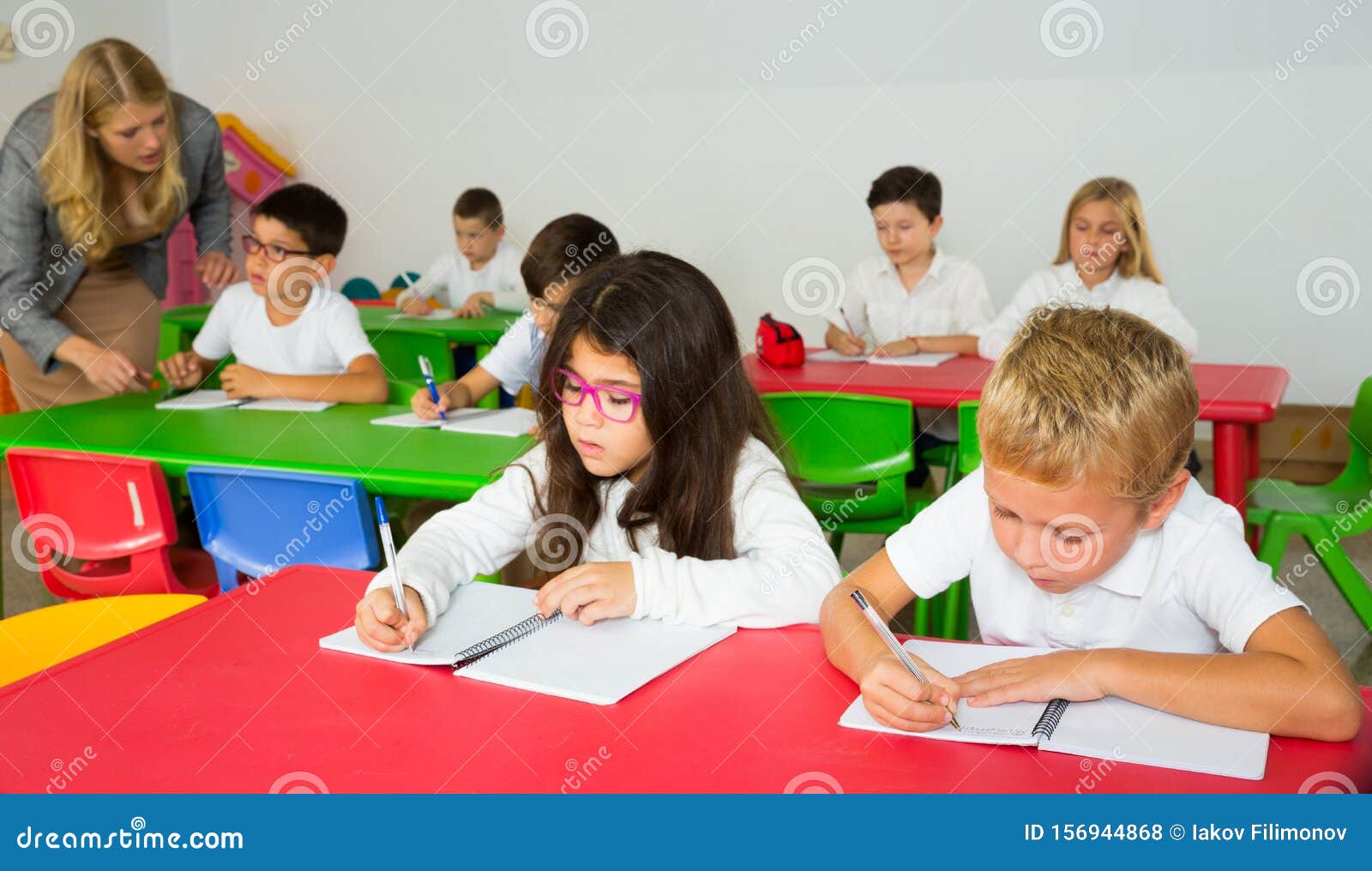 School Kids Studying in Classroom with Teacher Stock Photo - Image of ...