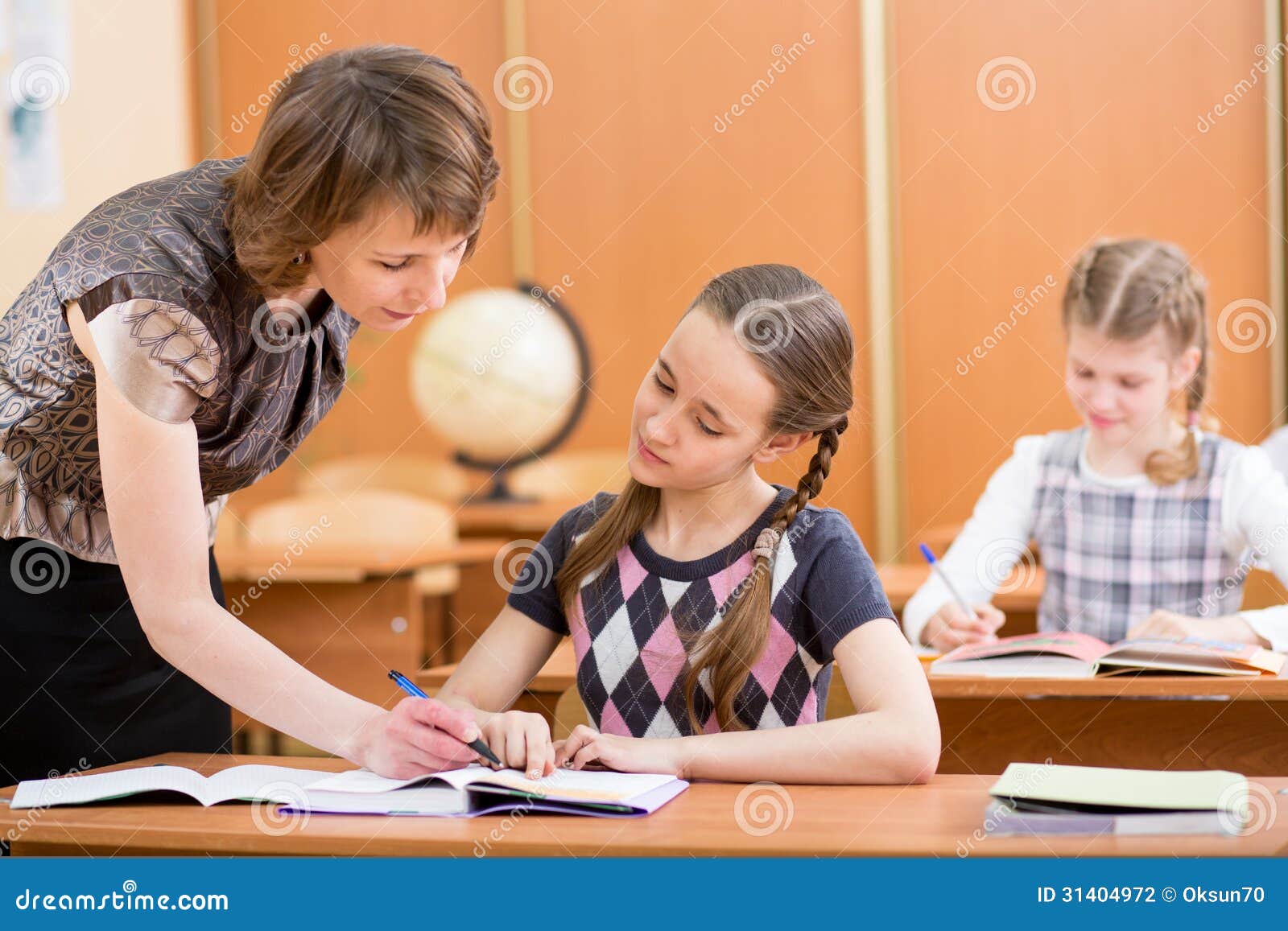 School Kids and Teacher Work at Lesson Stock Photo - Image of grade ...