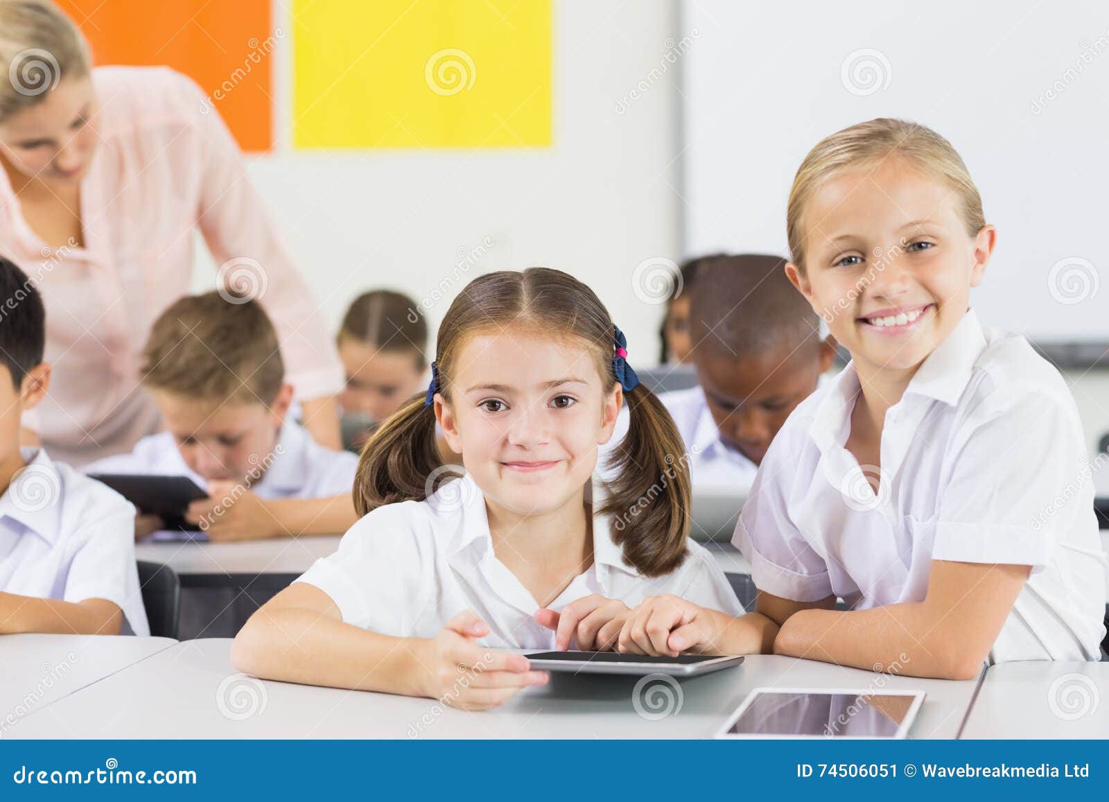 School Kids Using Digital Tablet in Classroom Stock Image - Image of ...