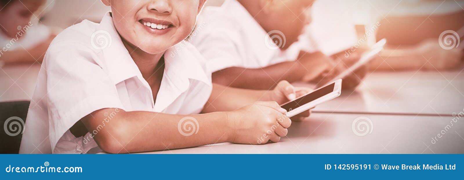 School Kids Using Mobile Phone in Classroom Stock Image - Image of ...