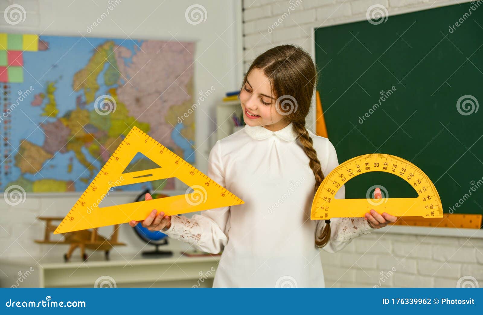 School Lesson Items. High School Student Learning Geometry in Class ...