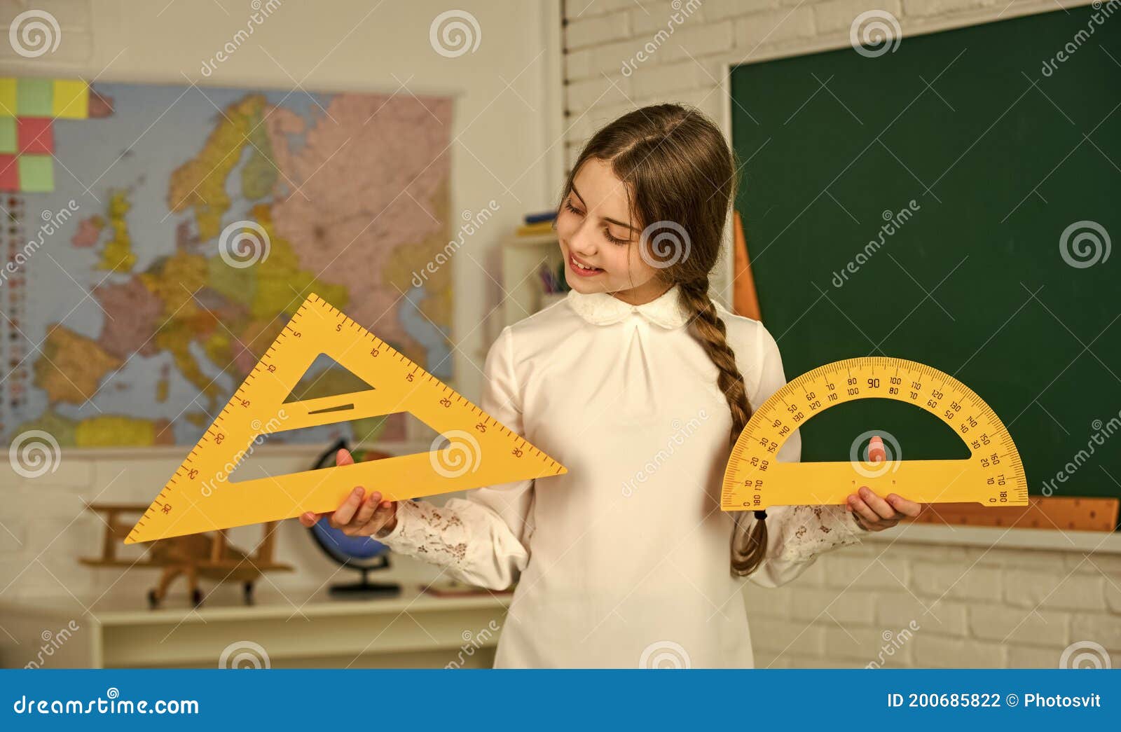 School Lesson Items. High School Student Learning Geometry in Class ...