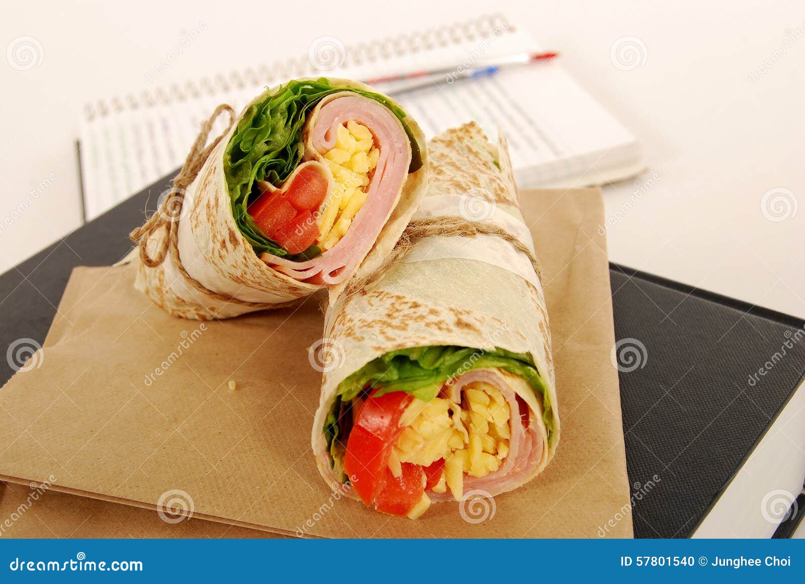 School Lunch: Ham and Cheese Wrap Sandwich with Lunch Bag on the Book ...