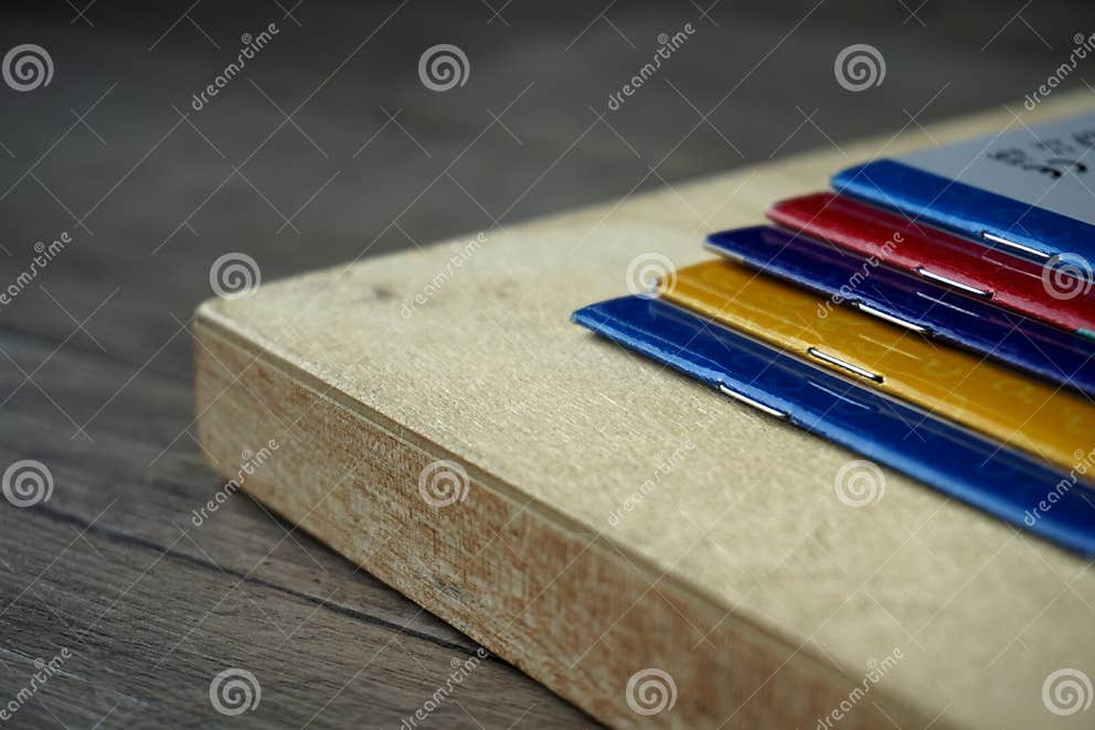 School Multi-colored Notebooks. Wooden Surface. Study at Home. Self ...