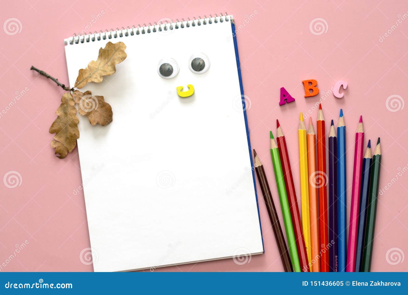 School Notebook and Colored Pencils Stationery. Back To School Concept ...