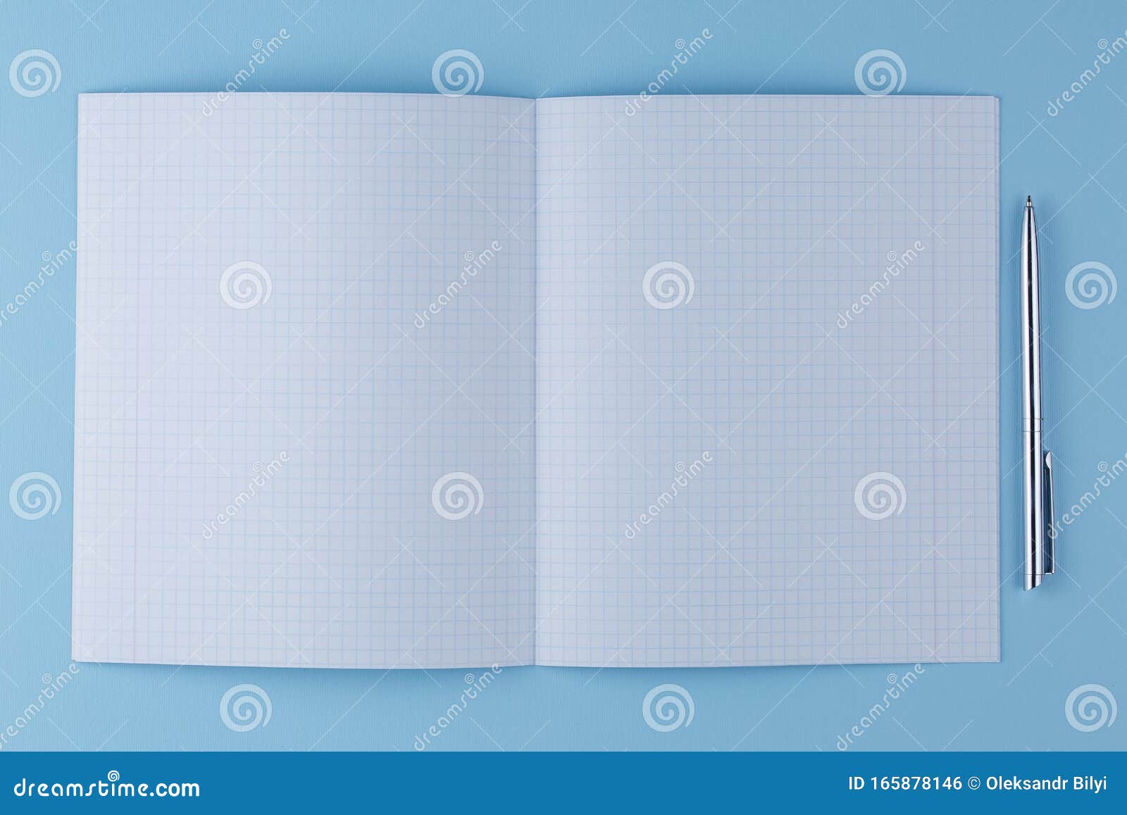 School Notebook with Pen on a Blue Table Top View Stock Photo - Image ...