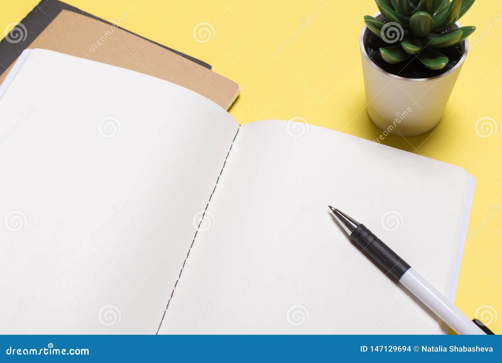 School Notebook on a Yellow Background Stock Photo - Image of desk ...