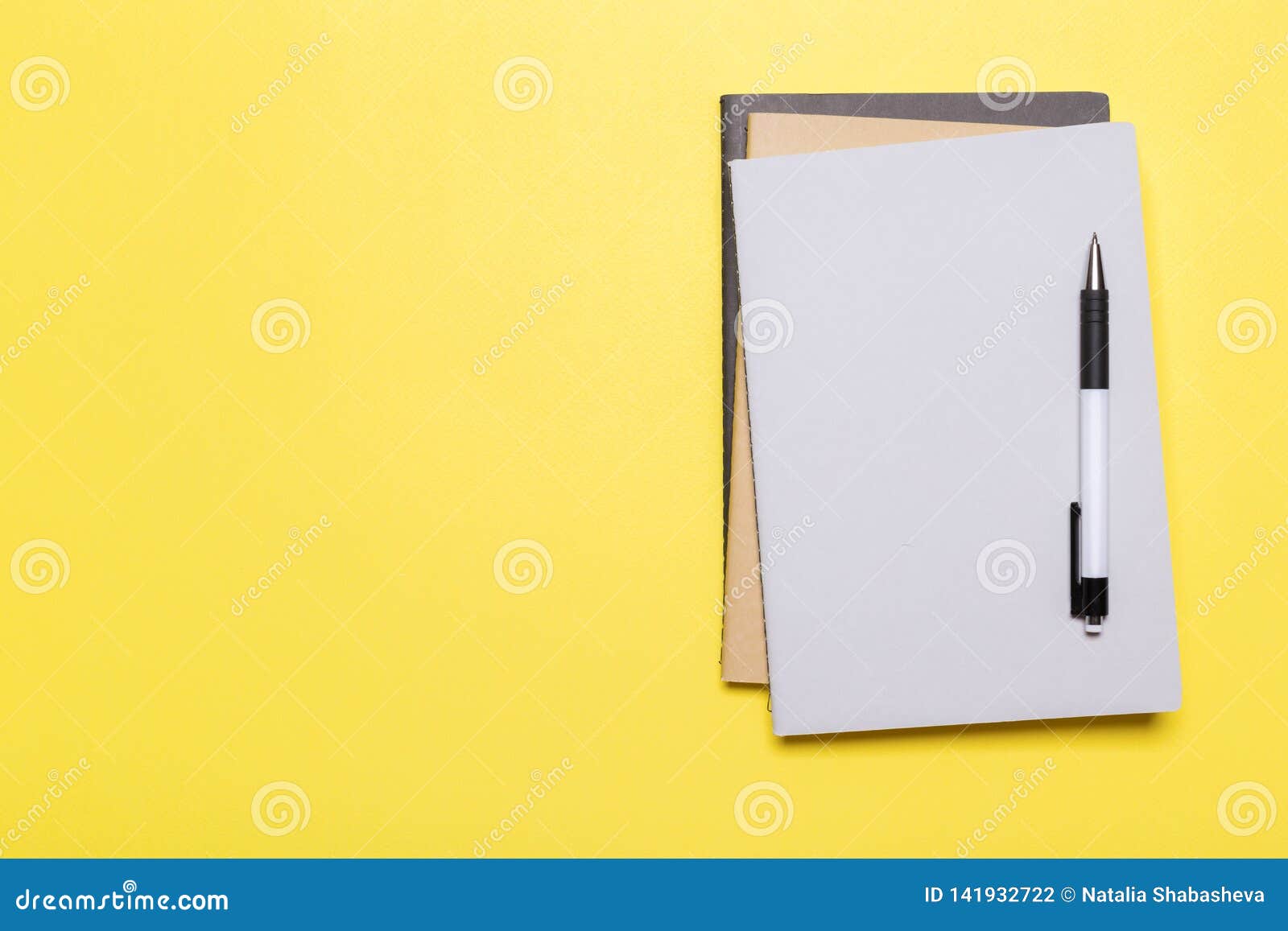School Notebook on a Yellow Background Stock Photo - Image of ...