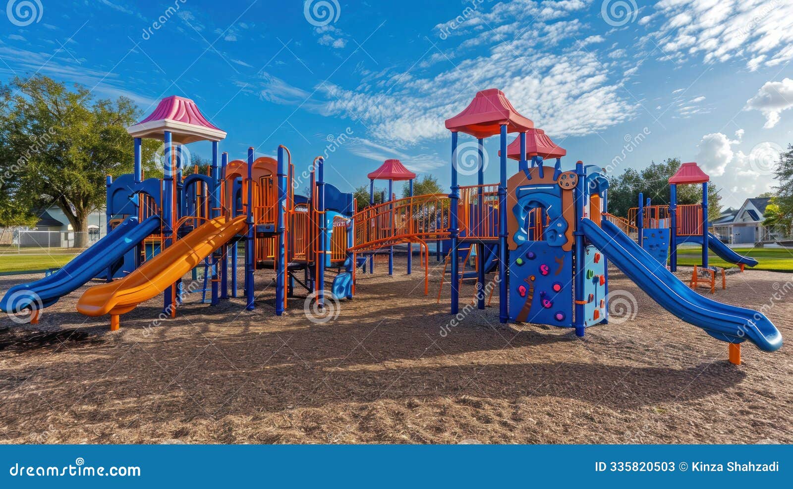 A School Playground with Clean and Brightly Colored Play Structures ...