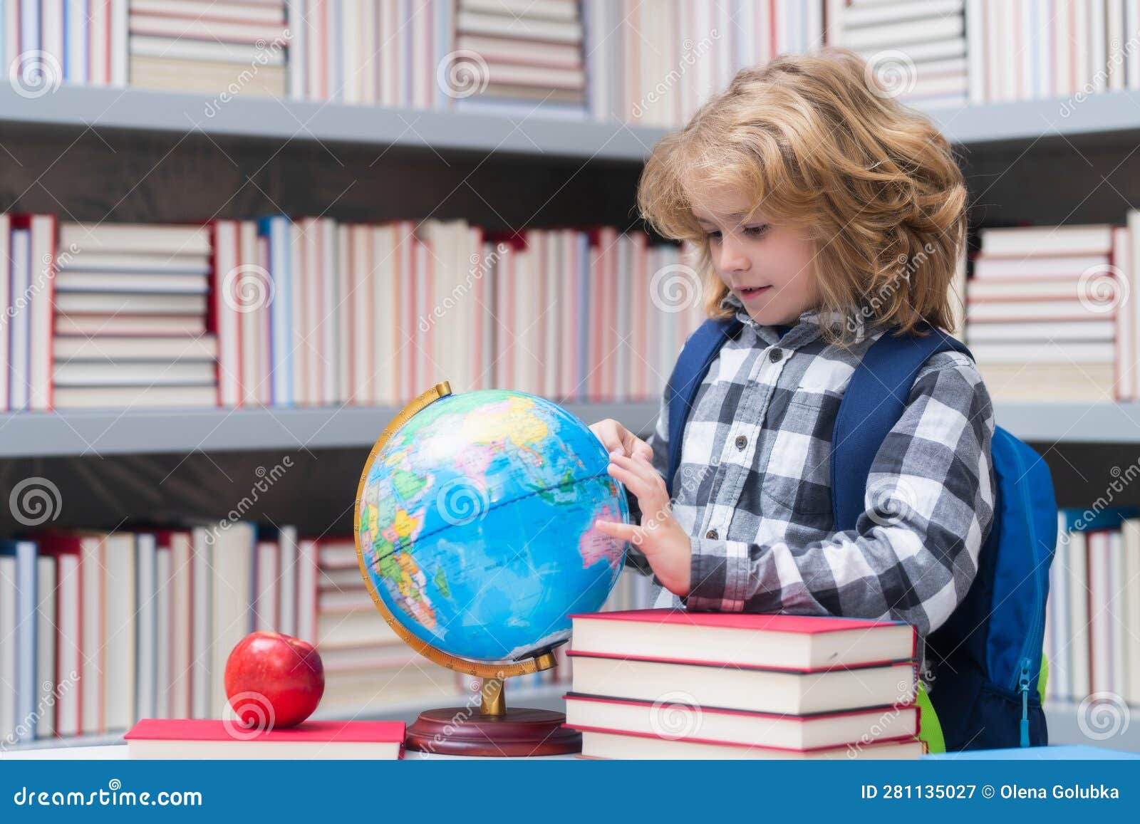School Pupil Looking at Globe in Library, Geography Lesson. School ...