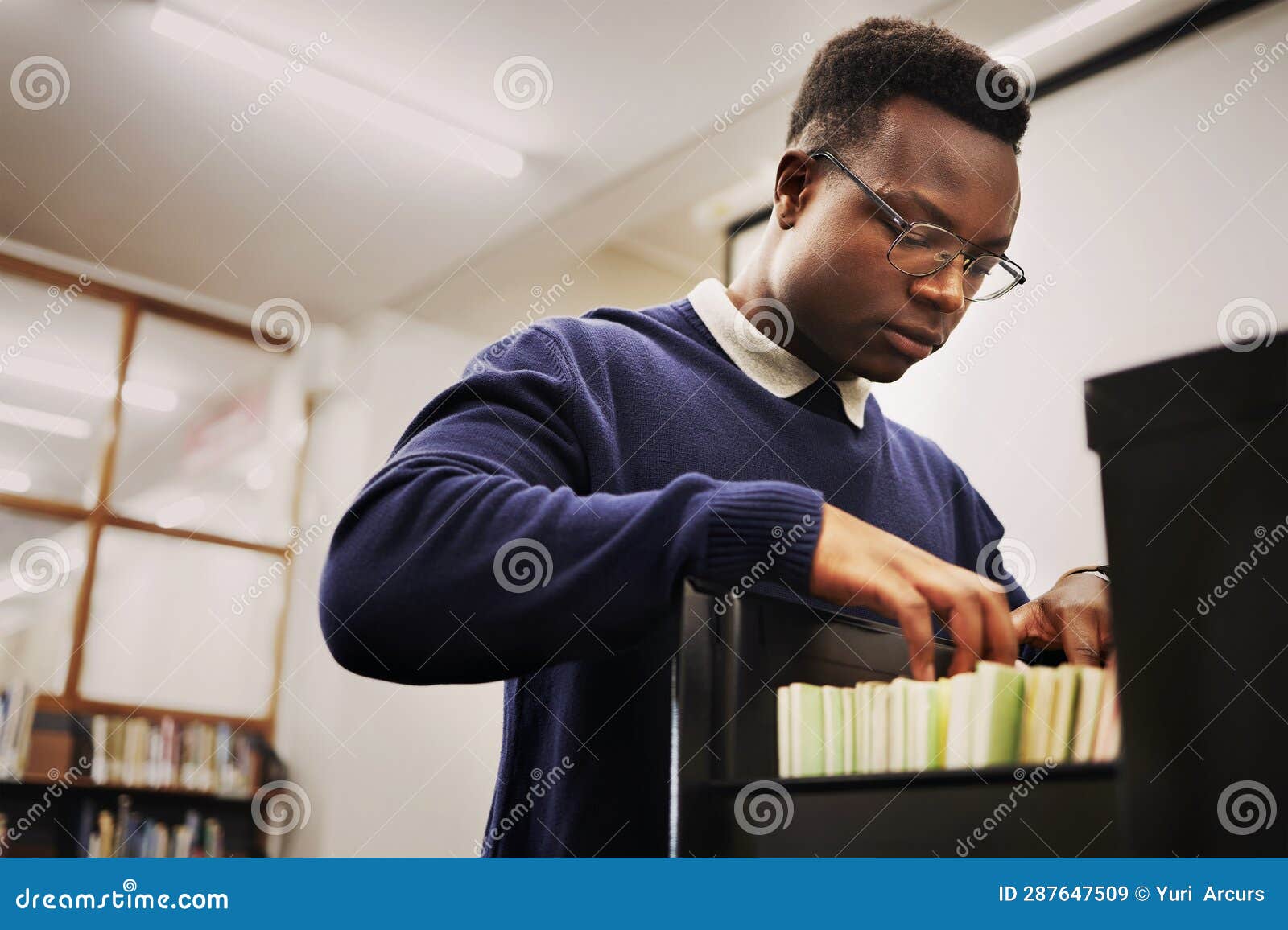 School Research, Notes and a Black Man in a Library for Knowledge ...