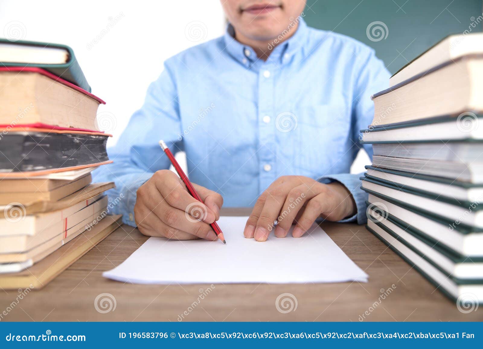 The School`s Male Teacher is Preparing Lessons Stock Photo - Image of ...