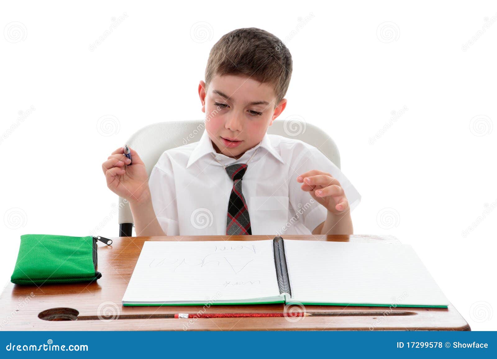 School Student Examining His Work Stock Photo - Image of schoolwork ...