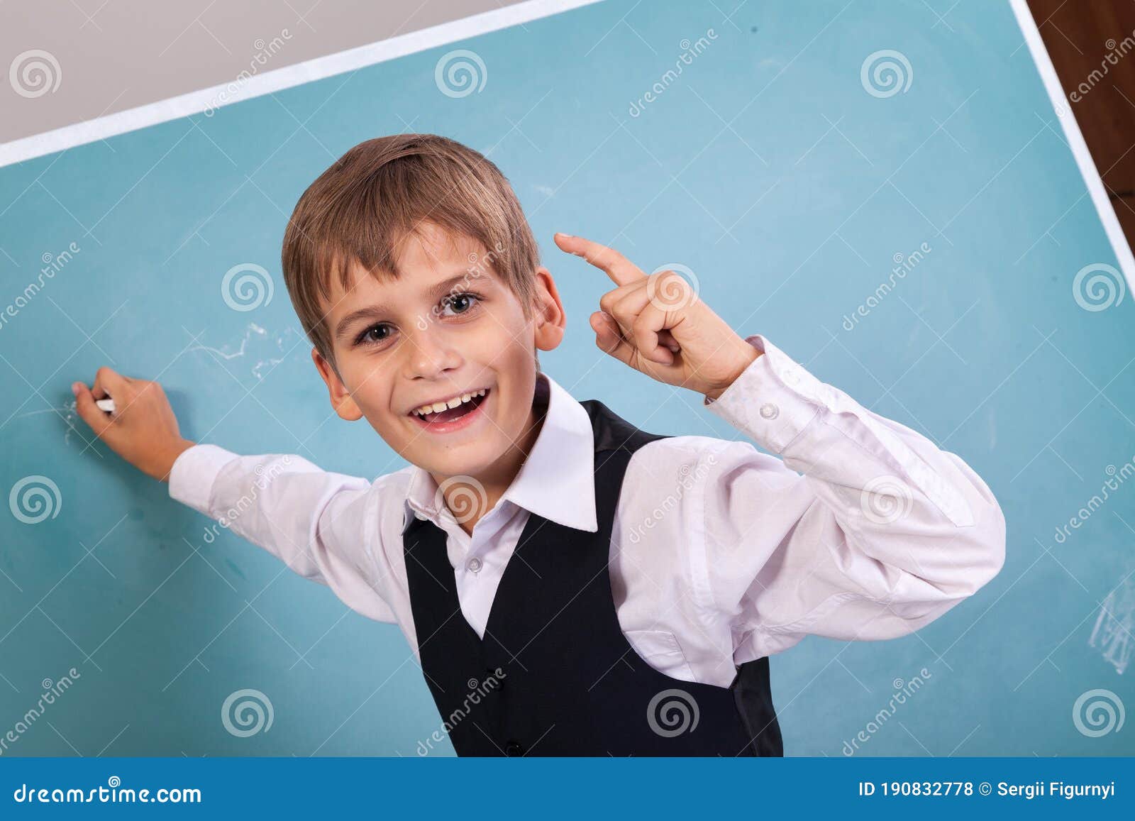 School Student Writing on Blackboard at School Stock Photo - Image of ...