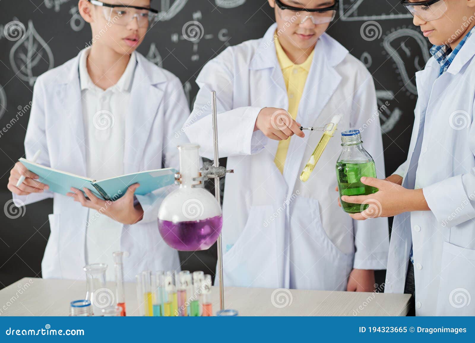 School Students Carrying Out Experiment Stock Image - Image of school ...