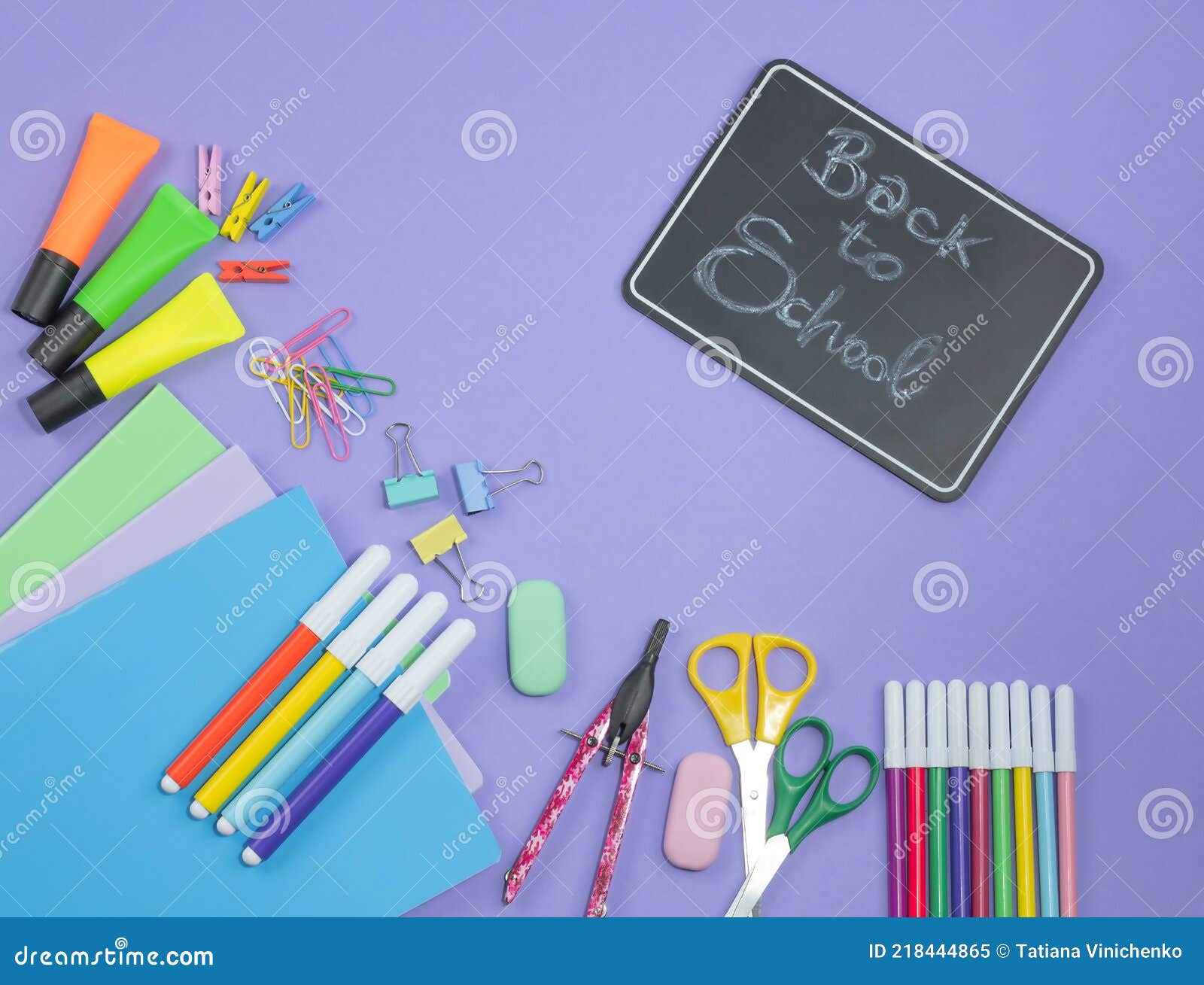 School Supplies Top View on a Violet Background with Copy Space. Stock ...