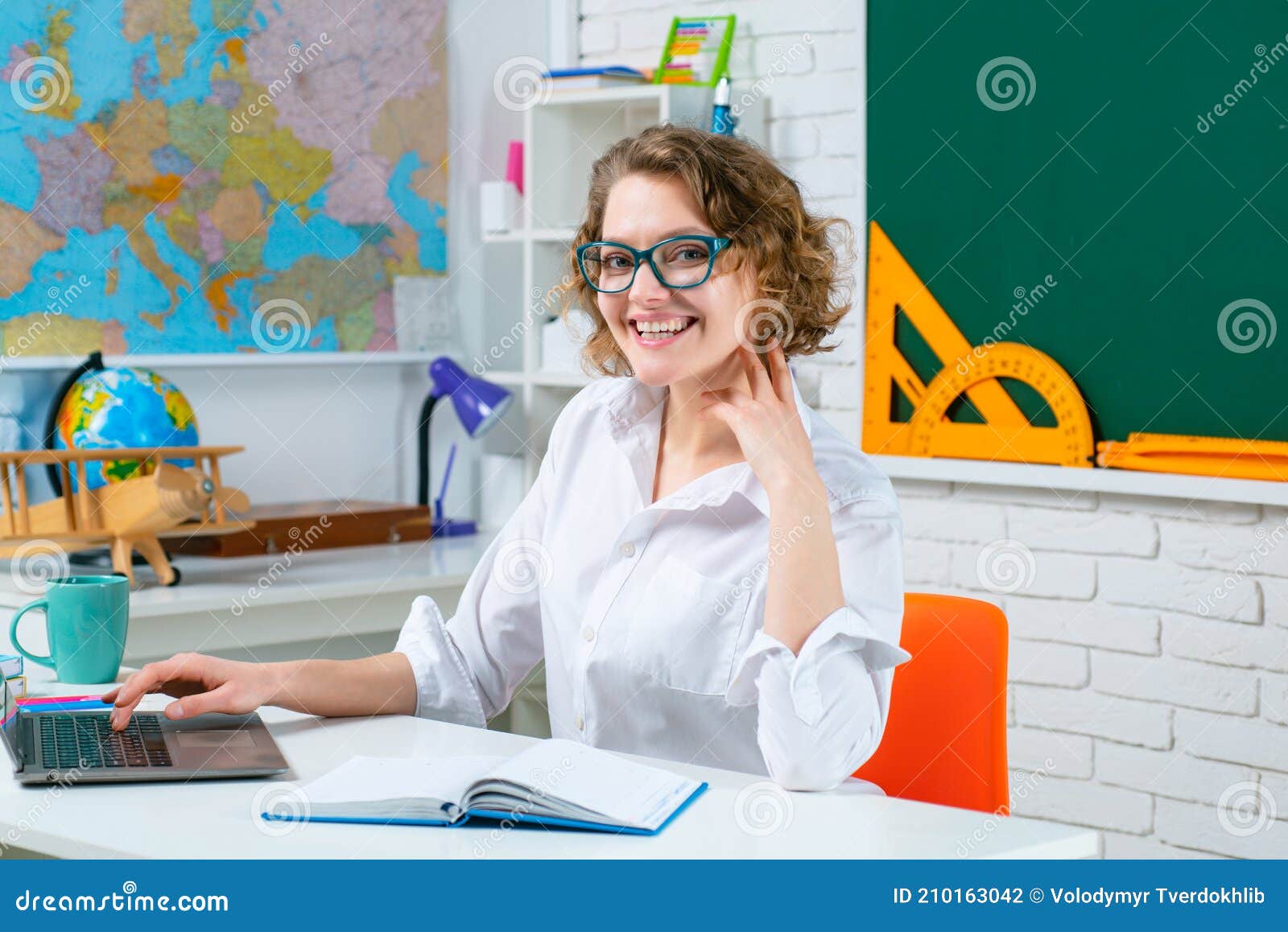 School Teacher in Classroom. Help To Learn. Education and Learning ...