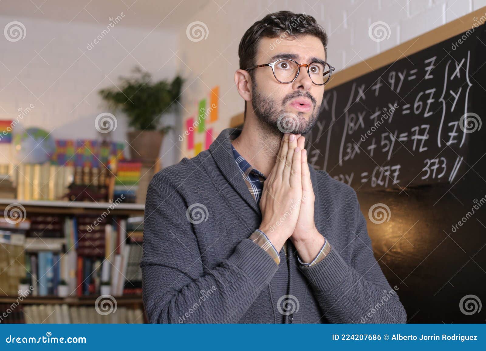 School Teacher Praying in Classroom Stock Photo - Image of faith ...