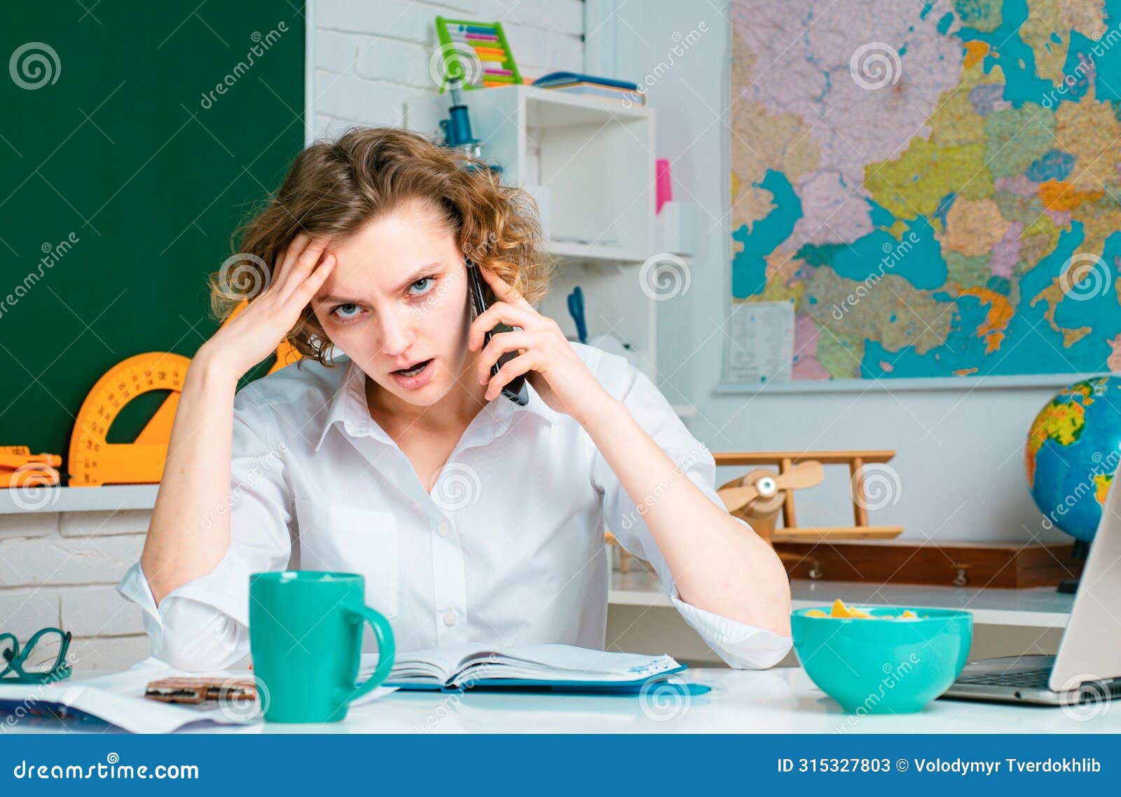 School Teacher Talking on Smartphone. Education Concept. Tutor in ...