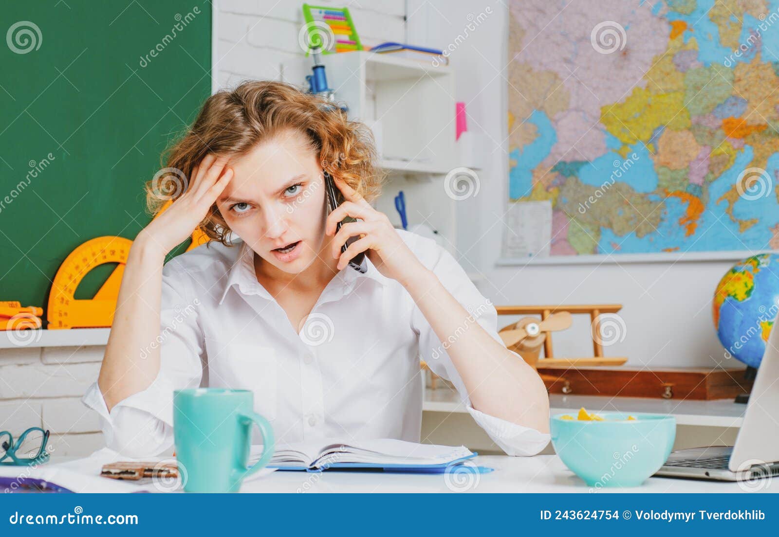 School Teacher Talking on Smartphone. Education Concept. Tutor in ...