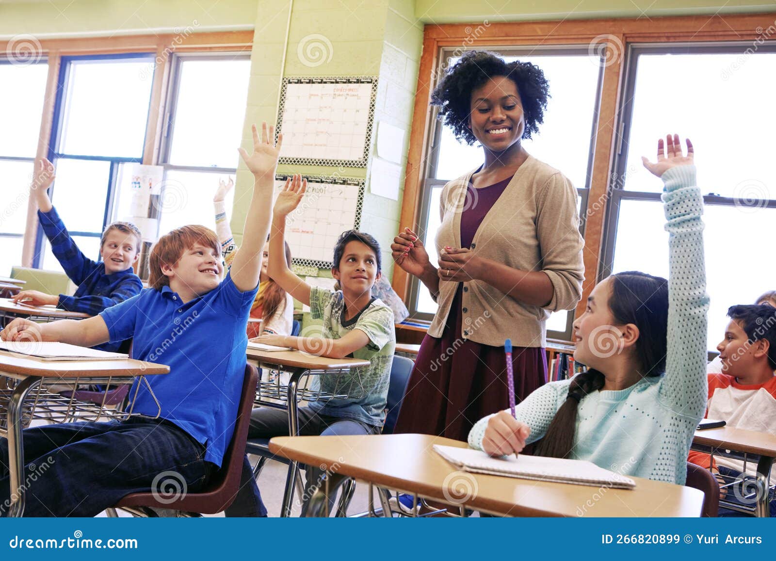School, Tutor and Students Raise Their Hands To Ask or Answer an ...
