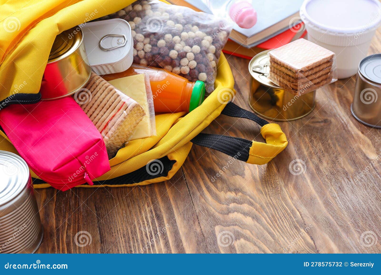 Schoolbag with Different Products on Table. Concept of Backpack Food ...