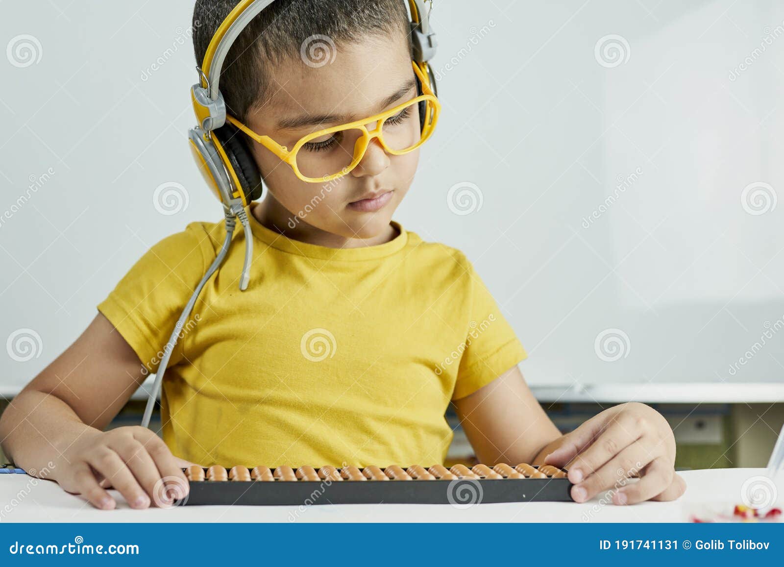 Mental Maths Concept With Little Kids Student On Blackboard Background ...