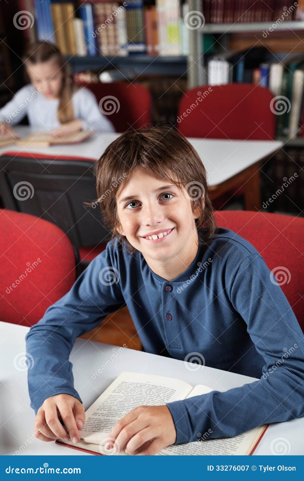Schoolboy with Book Sitting in Library Stock Image - Image of classmate ...