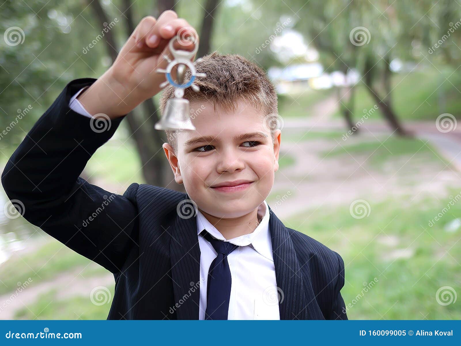 Schoolboy Boy Rings a Small Bell on September 1 Stock Image - Image of ...