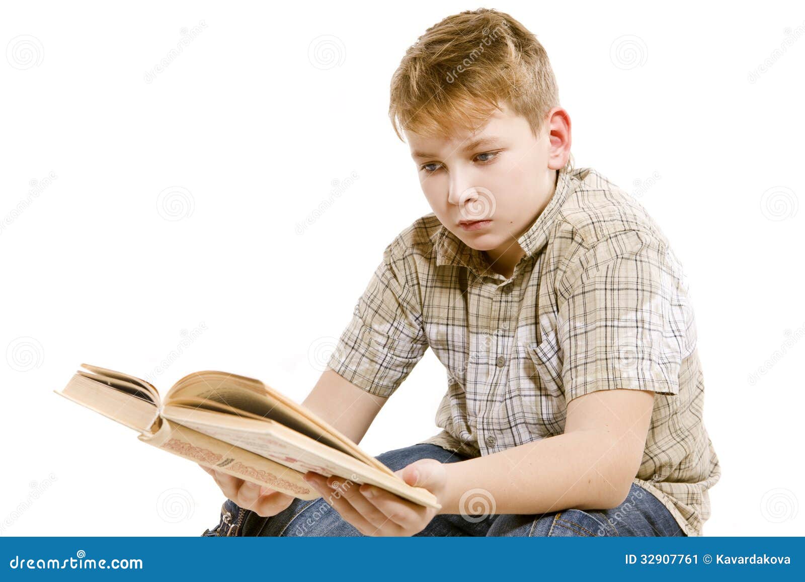 Schoolboy Carefully Reading Book Stock Photos - Free & Royalty-Free ...