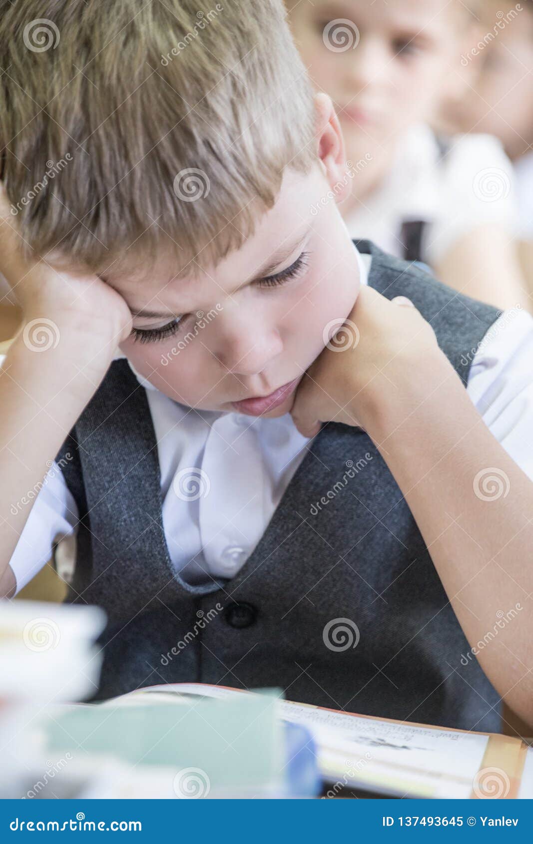 Schoolboy in classroom stock image. Image of happiness - 137493645