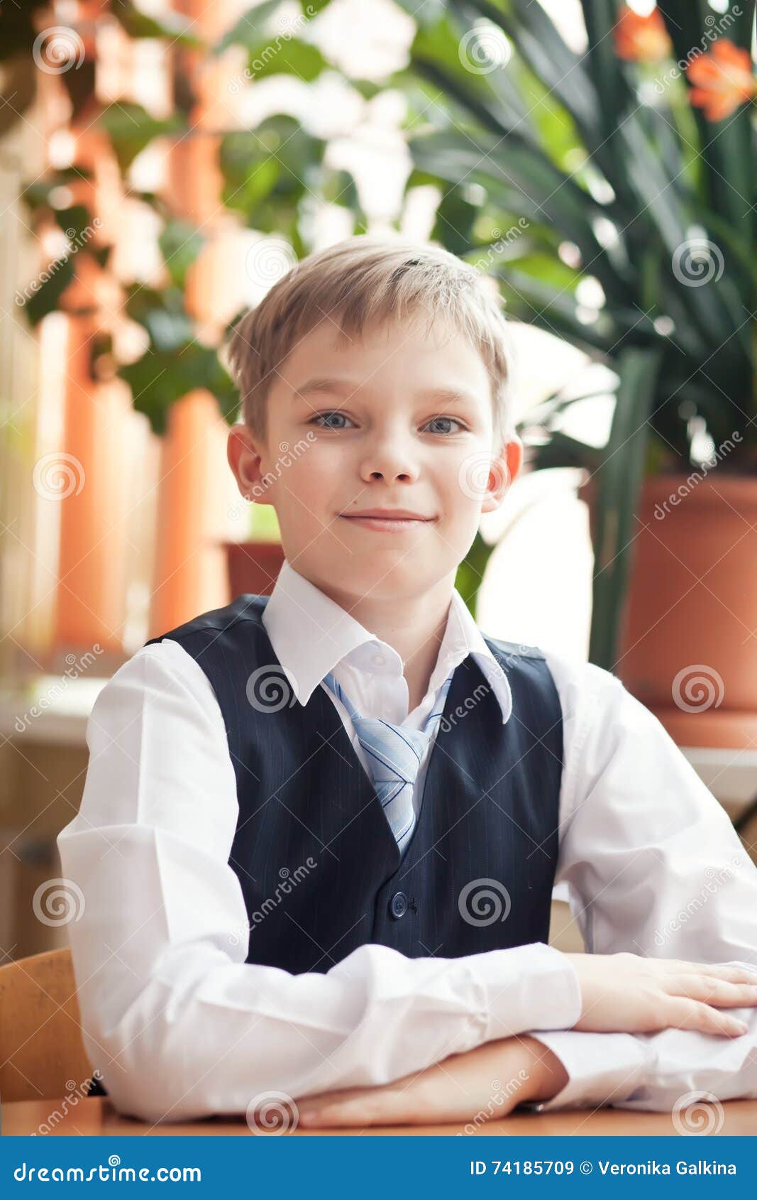 Schoolboy in classroom stock image. Image of childhood - 74185709