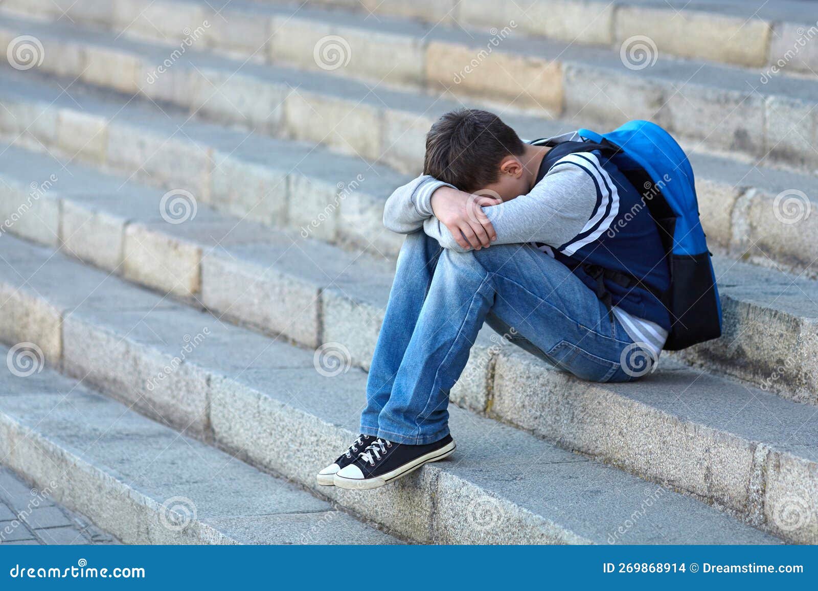 Schoolboy Crying in the Yard of the School Stock Photo - Image of ...