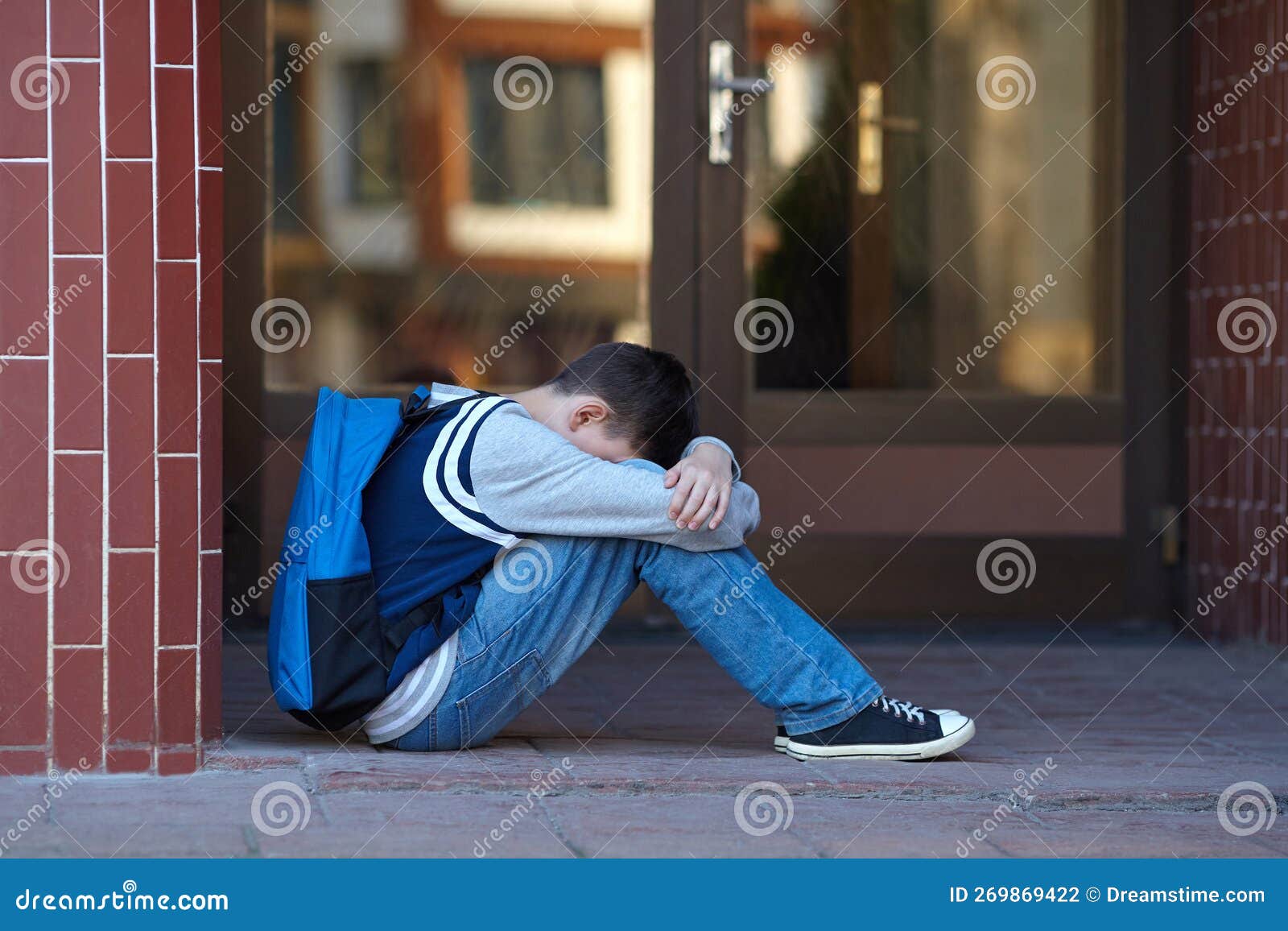 Schoolboy Crying in the Yard of the School Stock Photo - Image of ...