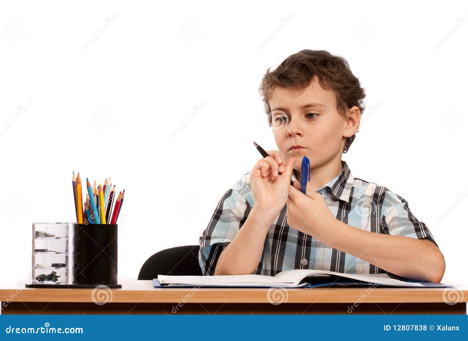 Sad Schoolboy Doing Homework At Home Alone Stock Photography ...