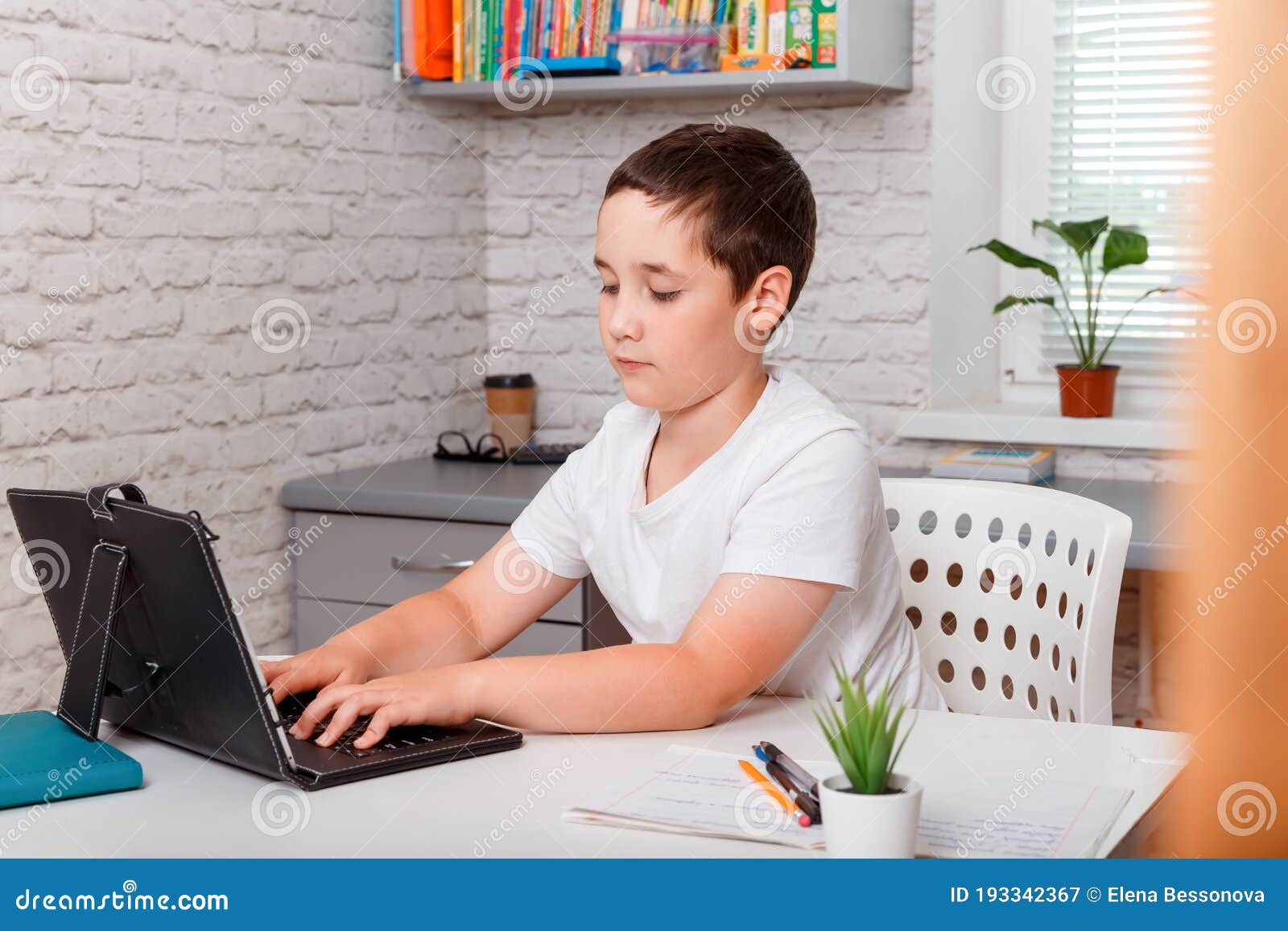 Schoolboy Doing Homework at the Computer on the Online Platform Stock ...