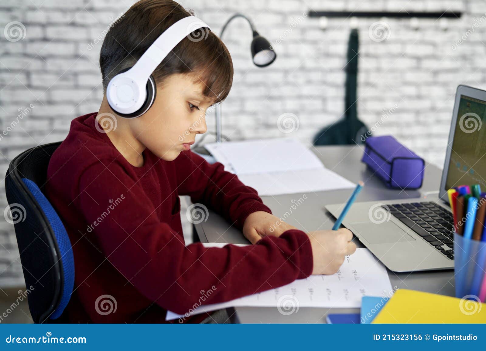 Side View of Schoolboy Doing Homework with Math Stock Photo - Image of ...