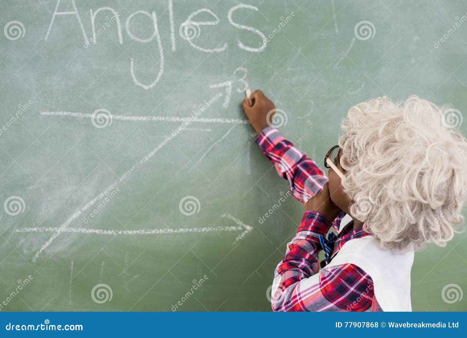Schoolboy Doing Mathematics on Chalkboard in Classroom Stock Photo ...