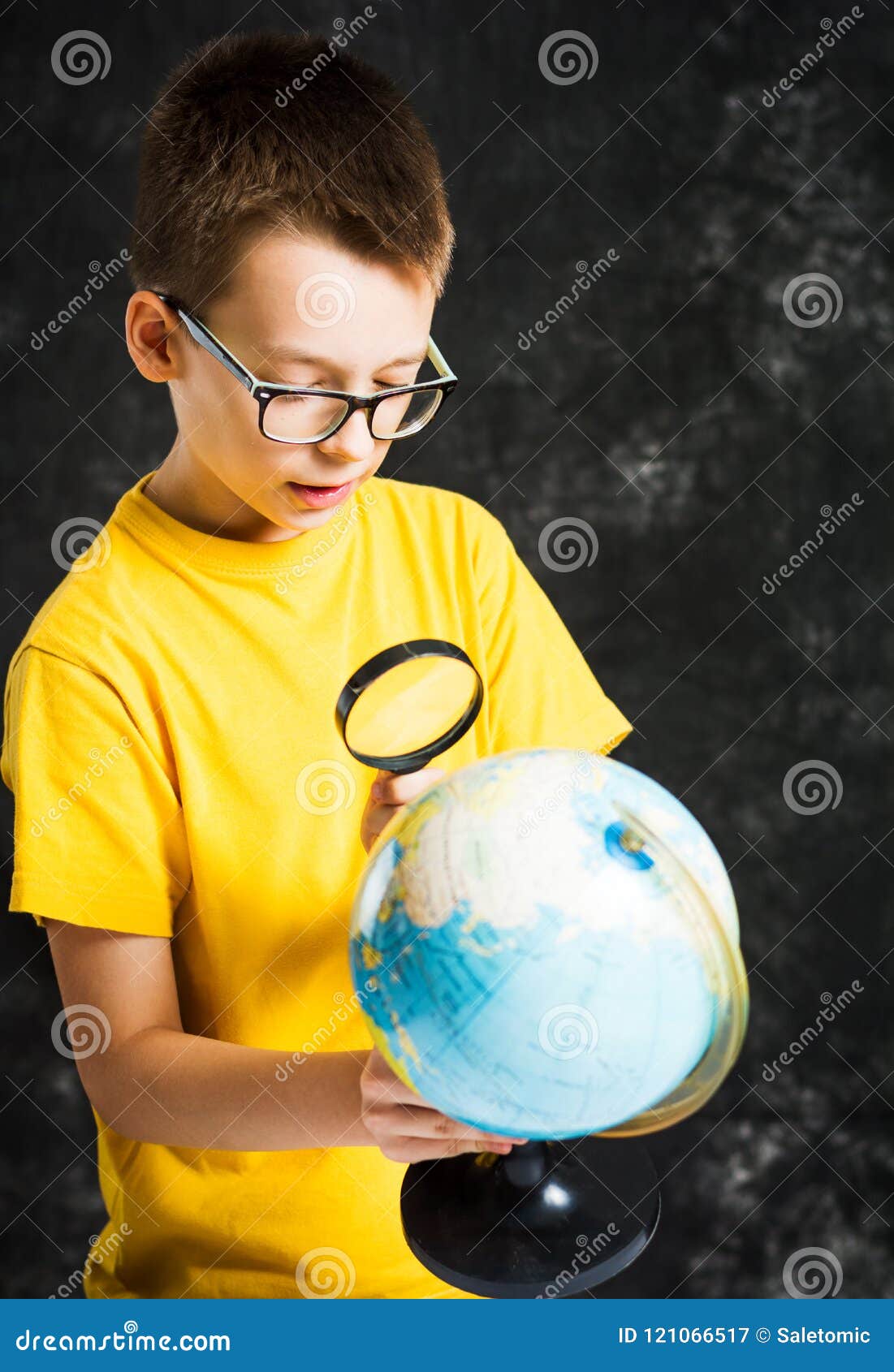 Schoolboy Exploring World through a Globe Stock Image - Image of ...