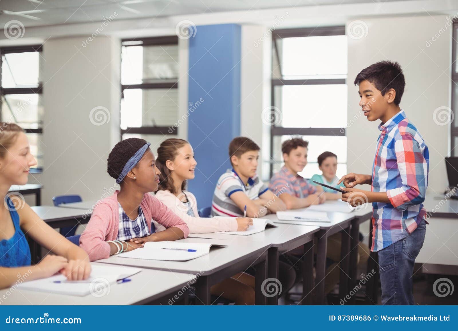 Schoolboy Giving Presentation in Classroom Stock Photo - Image of ...