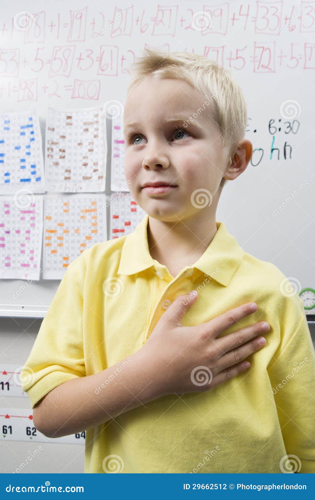 Schoolboy with His Hand Over Heart Stock Photo - Image of adorable ...