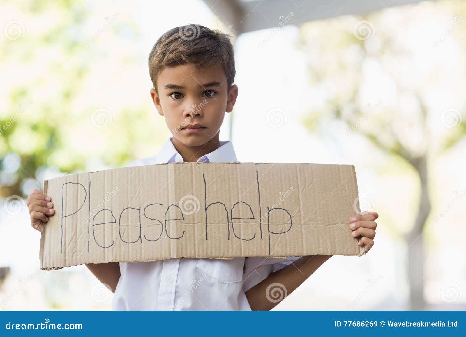 Schoolboy Holding Placard Which Reads Please Help Stock Image - Image ...