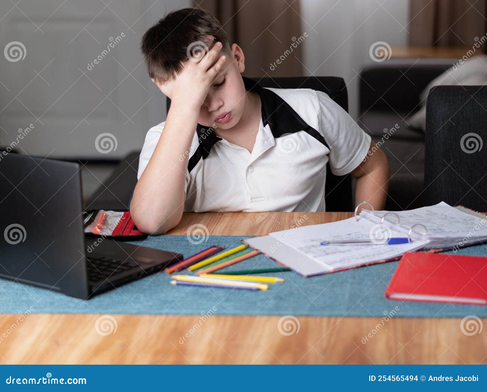Schoolboy Looking Frustrated and Tired while Doing Homework Stock Photo ...